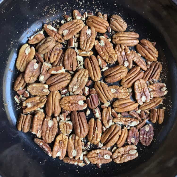 Easy Pecan Tassie Cheesecake with Biscoff Crust - Biting at the Bits