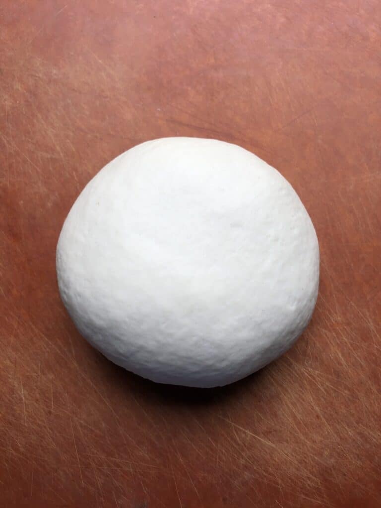 Best Thin-Crust Pizza Dough Recipe (Using Bread Flour) - Biting at the Bits